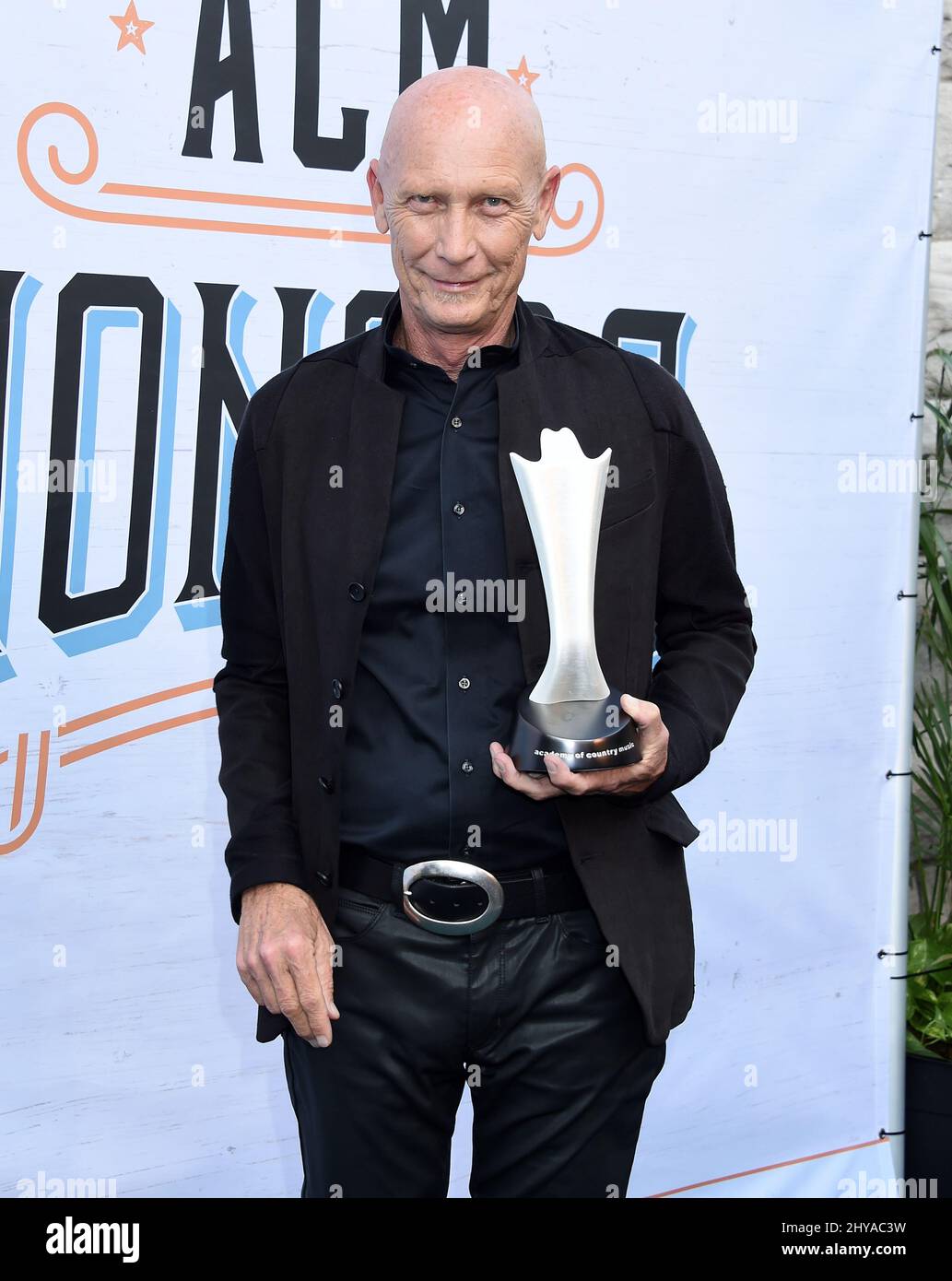 Michael rhodes poses hi-res stock photography and images - Alamy