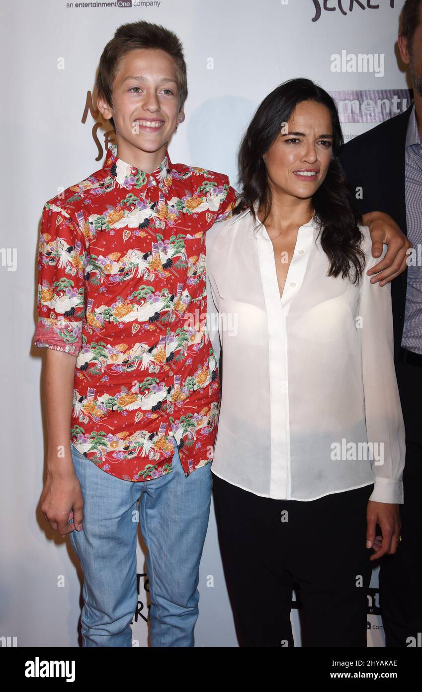Percy Hynes White and Michelle Rodriguez arriving at "Milton's Secret ...