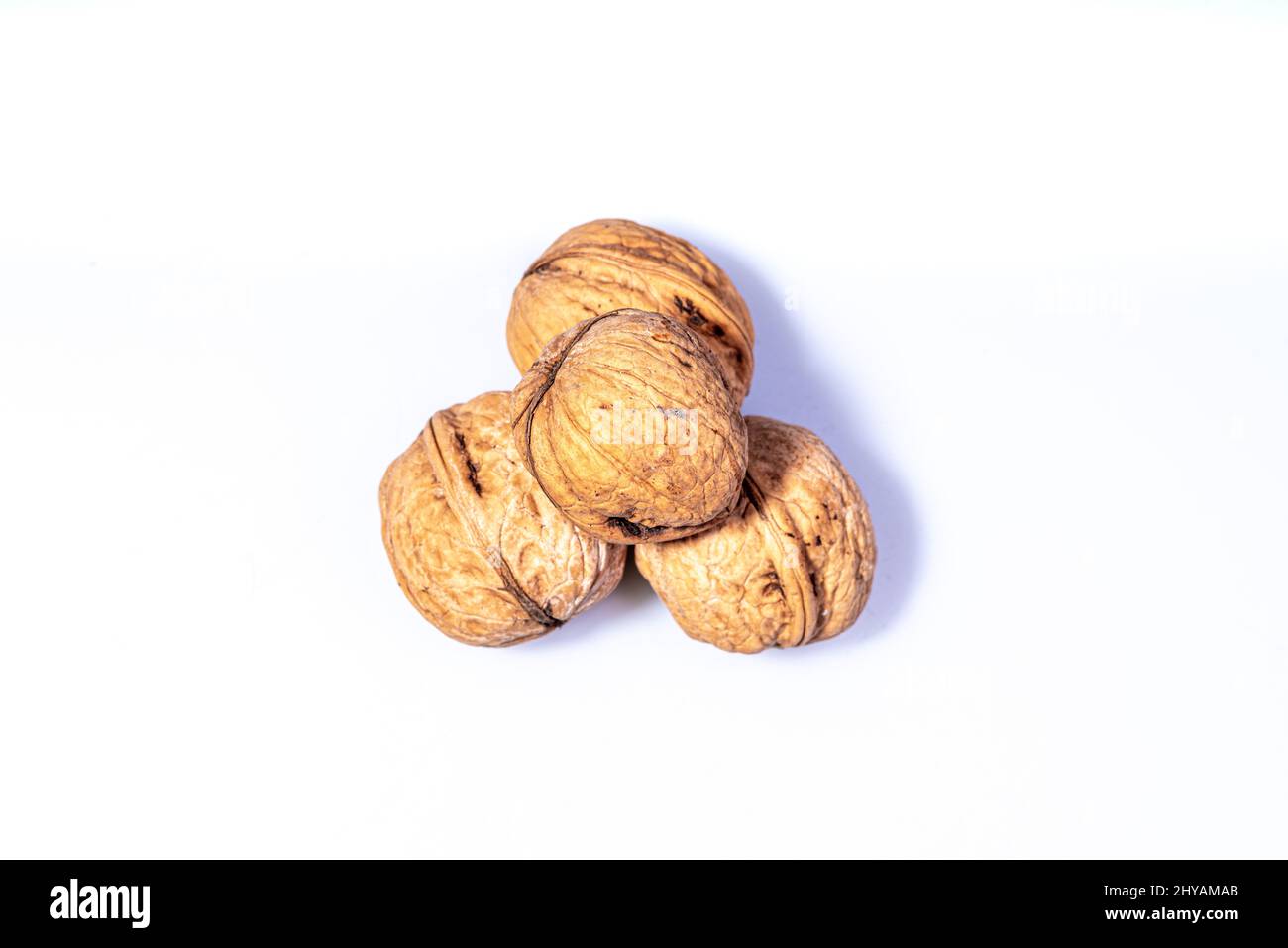 Closeup shot of nuts on white background Stock Photo - Alamy