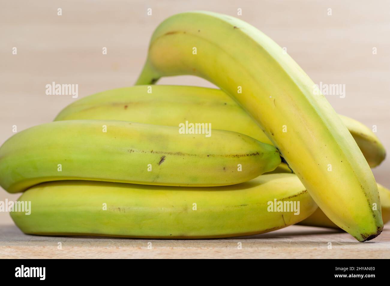 close-up photo of bananas lying on the table Stock Photo - Alamy