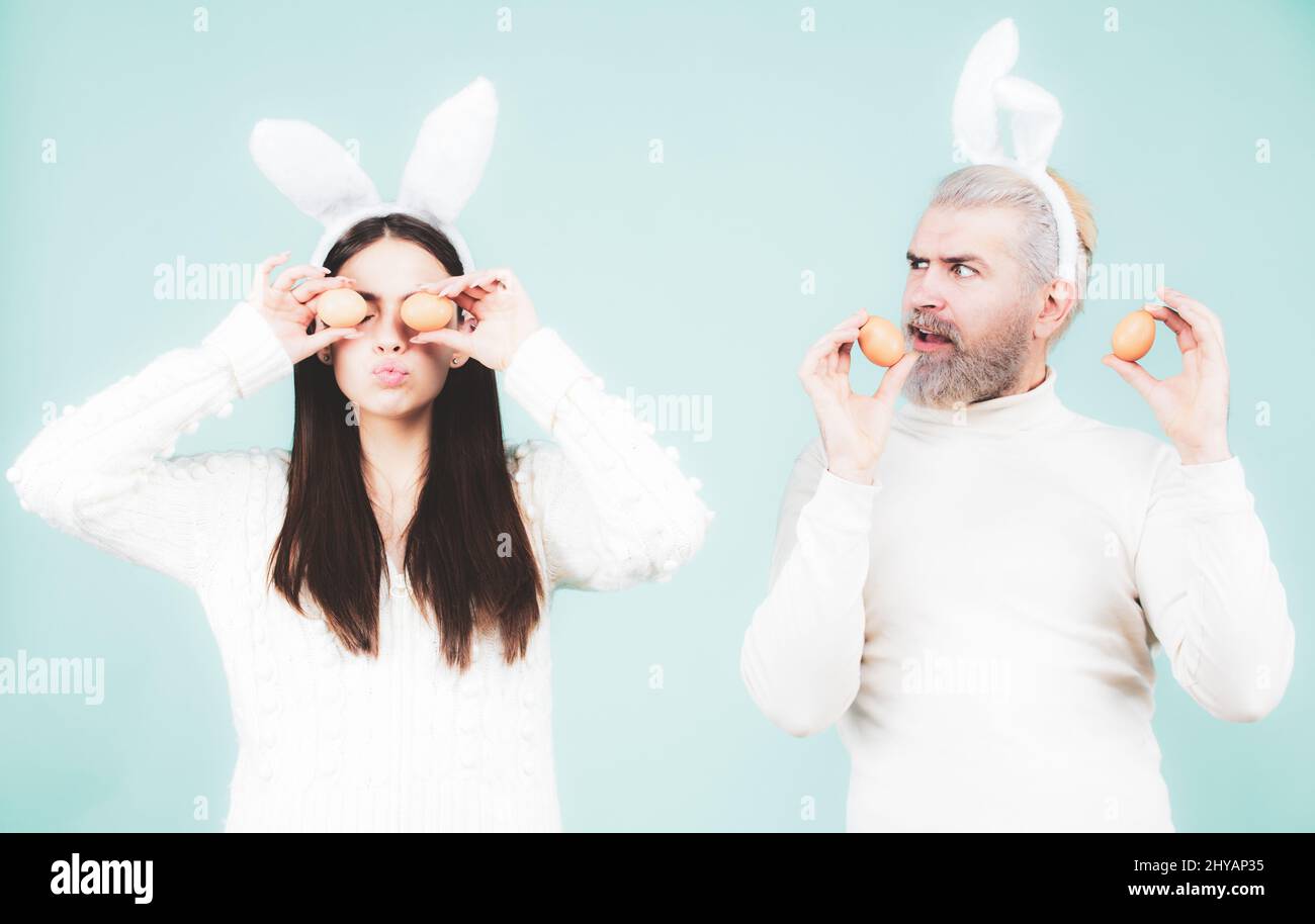 Easter family. Happy friends with bunny ears. Easter couple Stock Photo ...