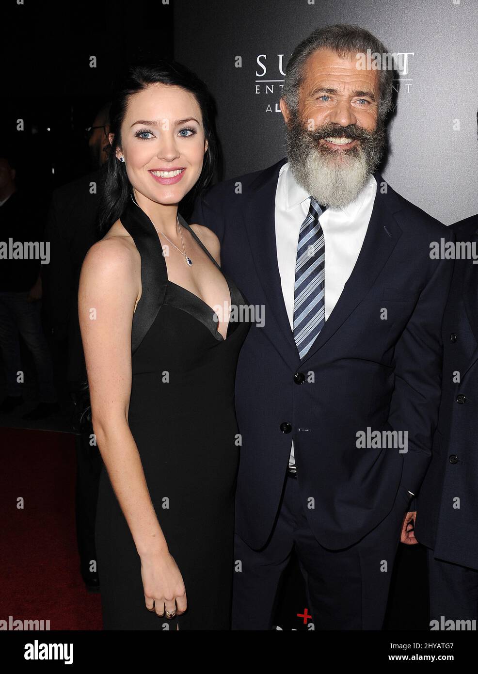 Mel Gibson, Rosalind Ross attending the premiere of 'Hacksaw Ridge' in ...