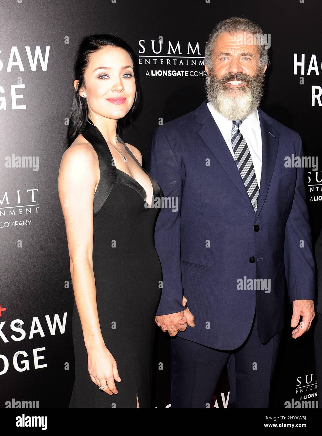 Mel Gibson, Rosalind Ross attending the premiere of 'Hacksaw Ridge' in ...