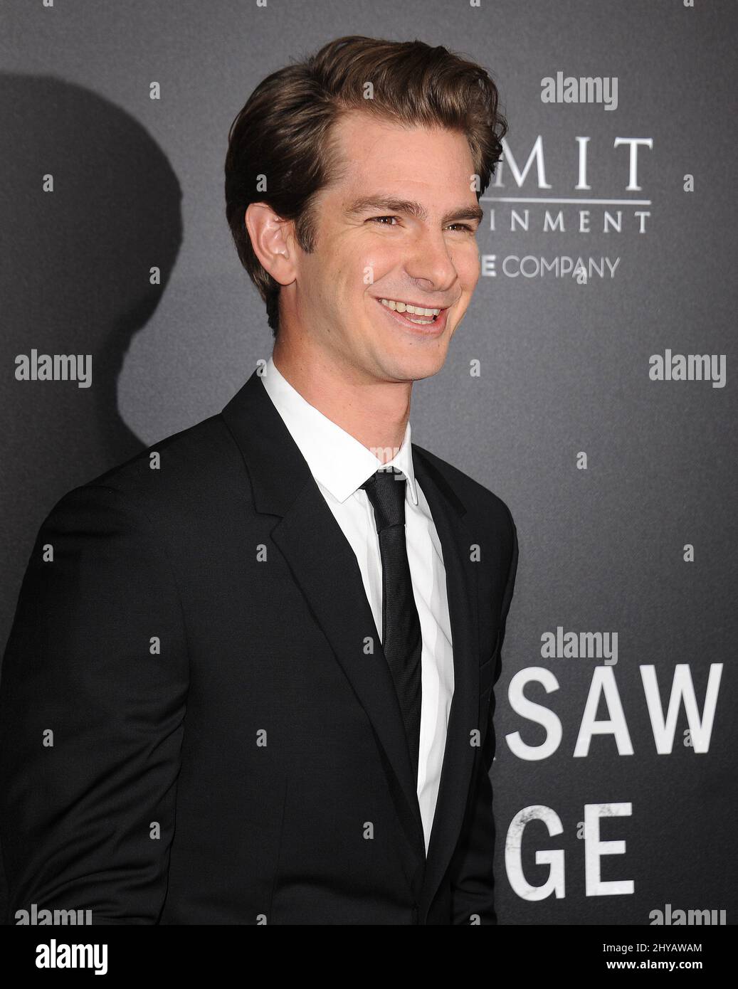 Brenda Song And Andrew Garfield Kiss