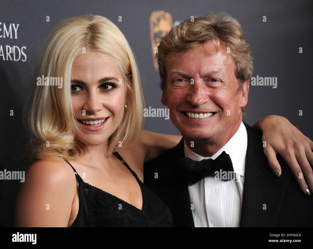 Pixie Lott and Nigel Lythgoe attending The British Academy Britannia ...