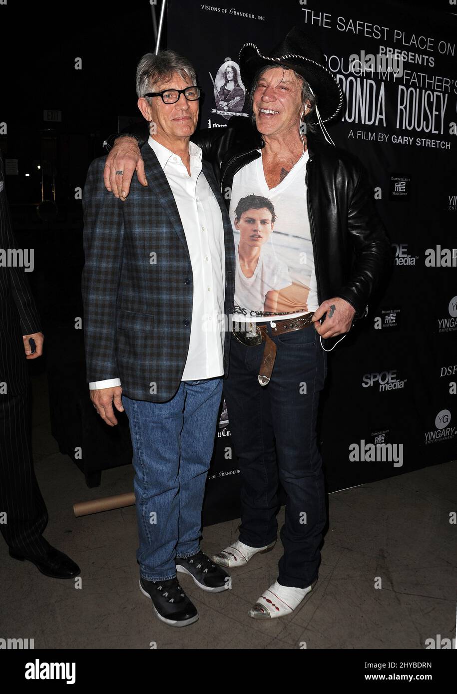 Mickey Rourke, Eric Roberts attending a screening of Through My Father ...