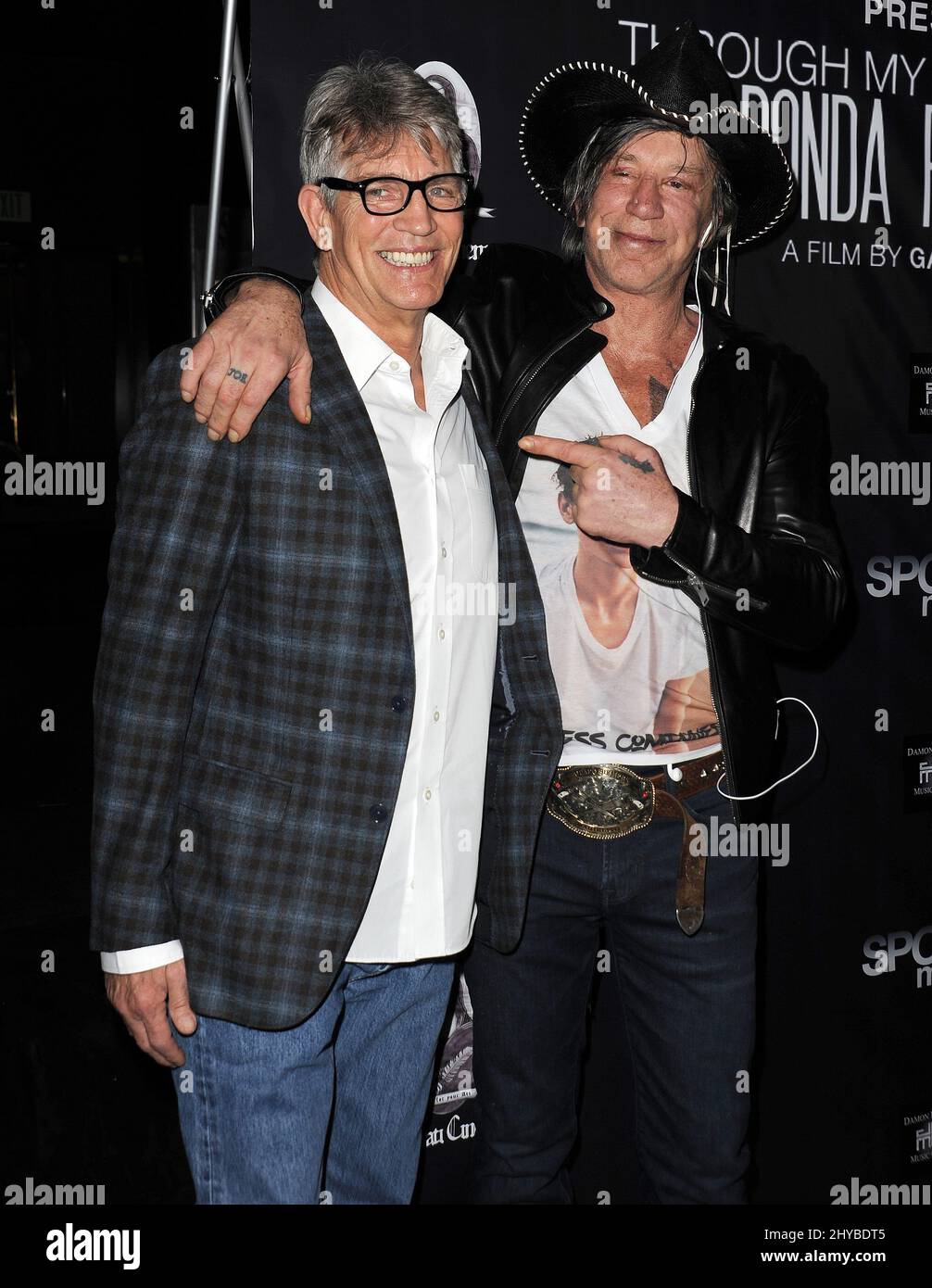 Mickey Rourke, Eric Roberts attending a screening of Through My Father ...