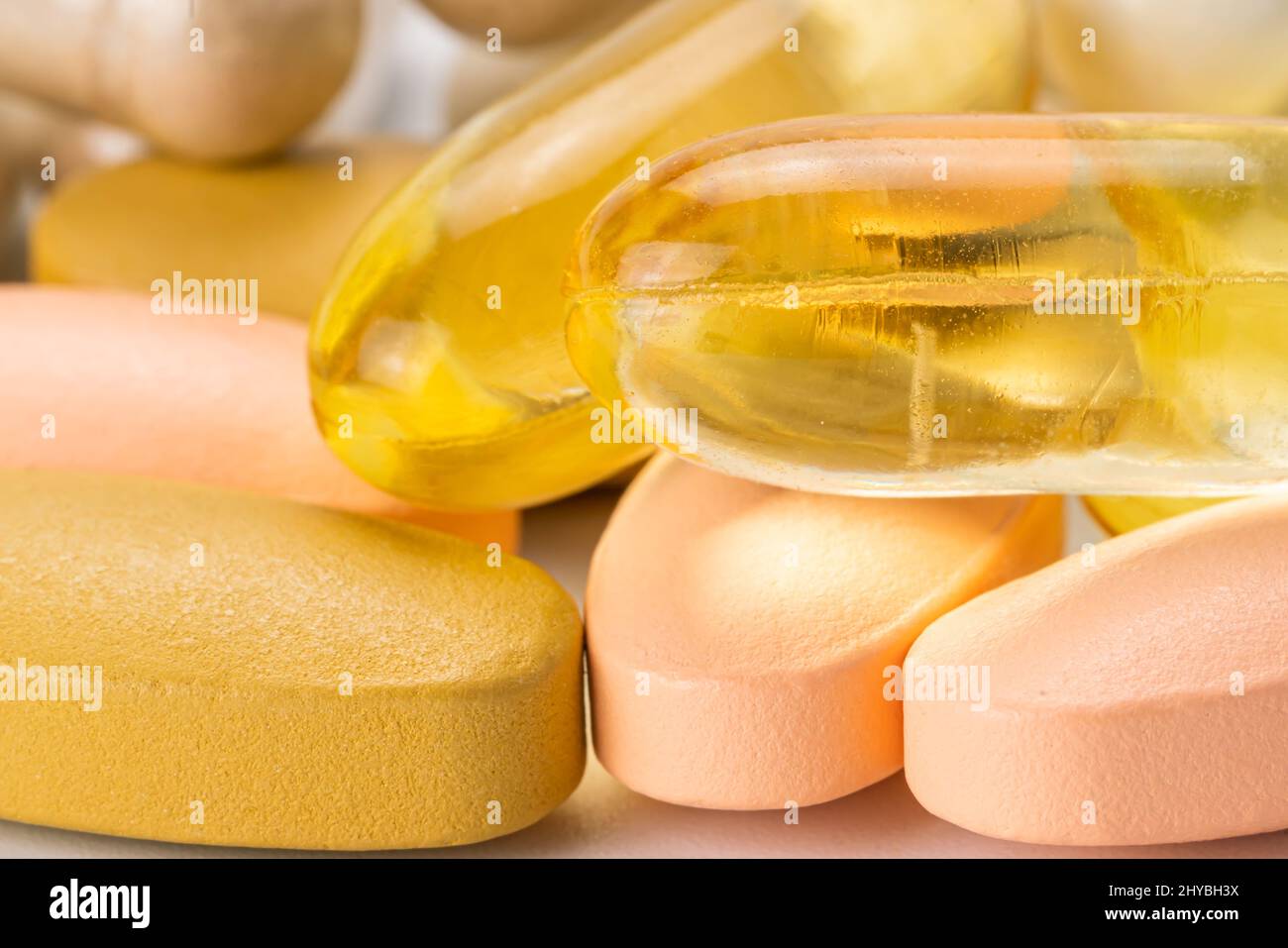 Extreme closeup view of various food supplement and vitamin tablets ...