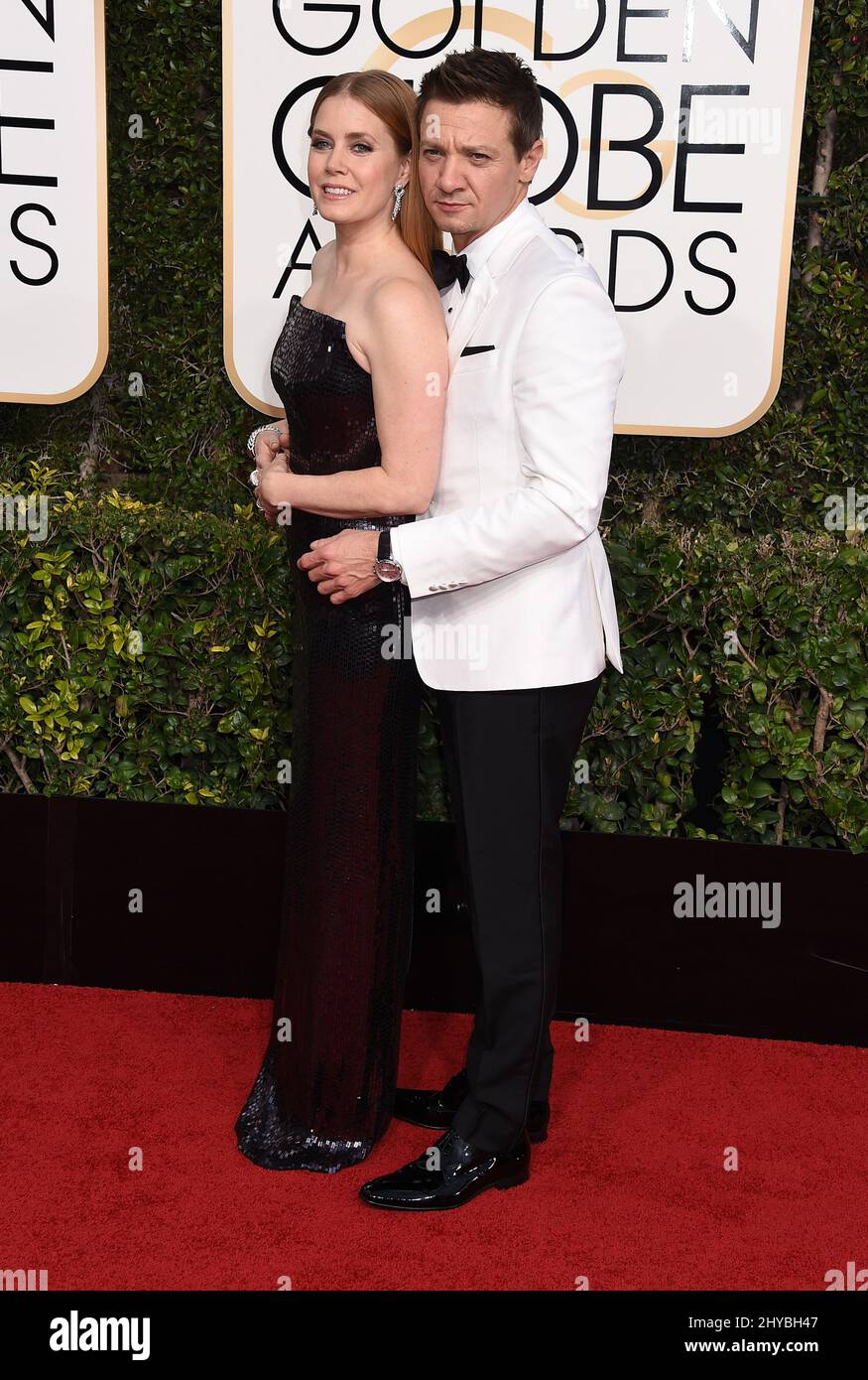 Amy Adams and Jeremy Renner attending the 74th Annual Golden Globe ...
