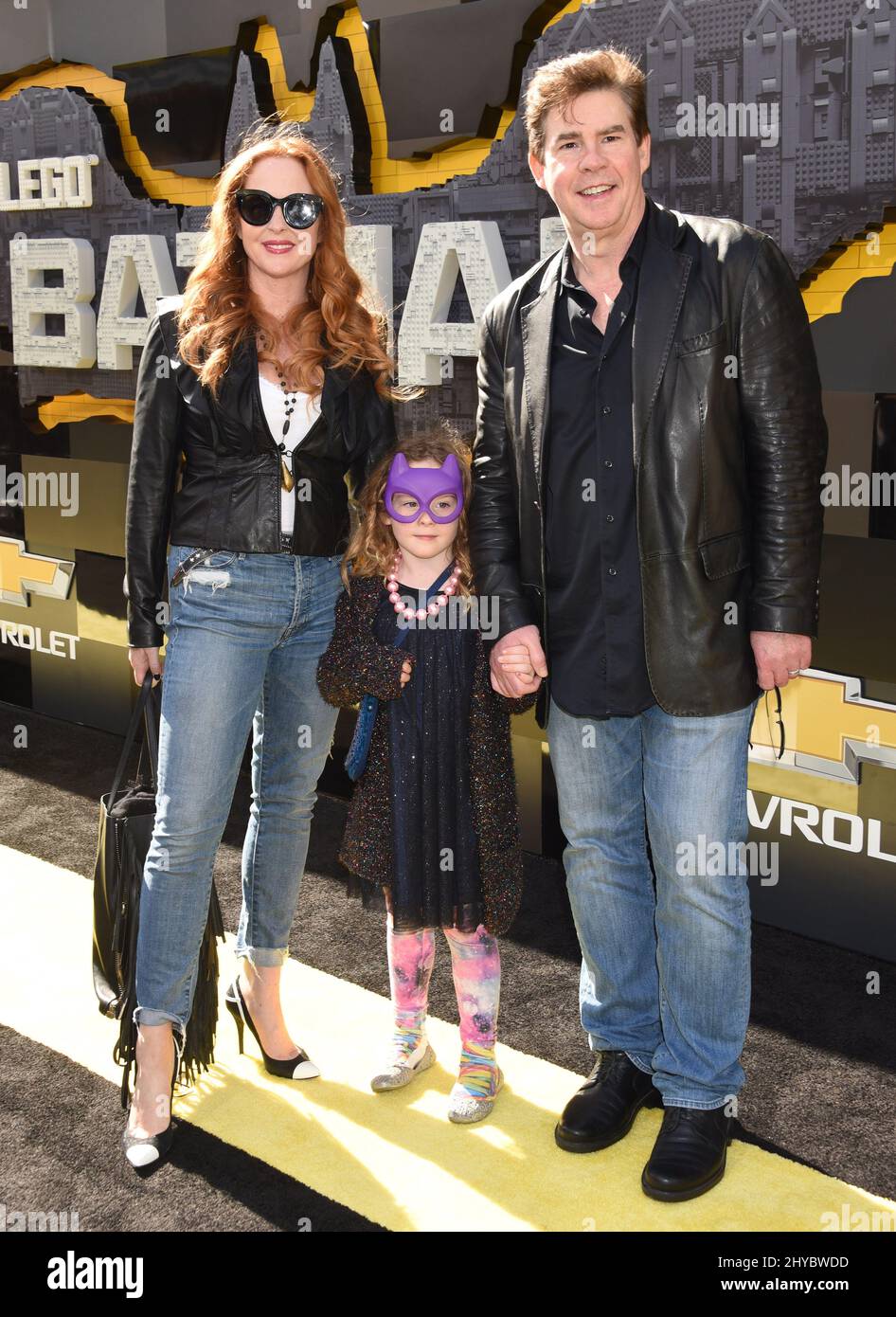 Ralph Garman, Kari Watson and Olivia attending the The Lego Batman ...