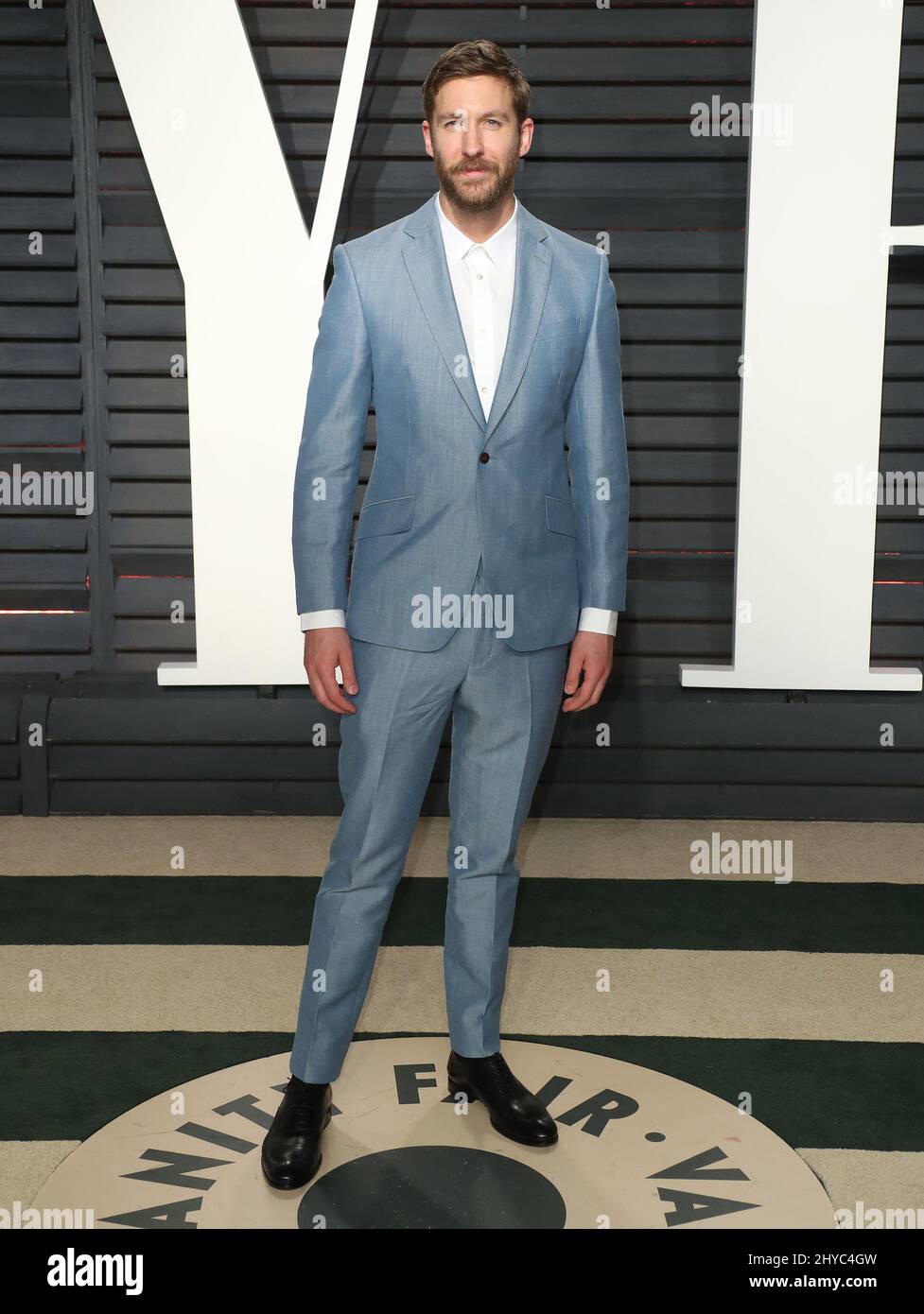 Calvin Harris arriving at the Vanity Fair Oscar Party in Beverly Hills ...
