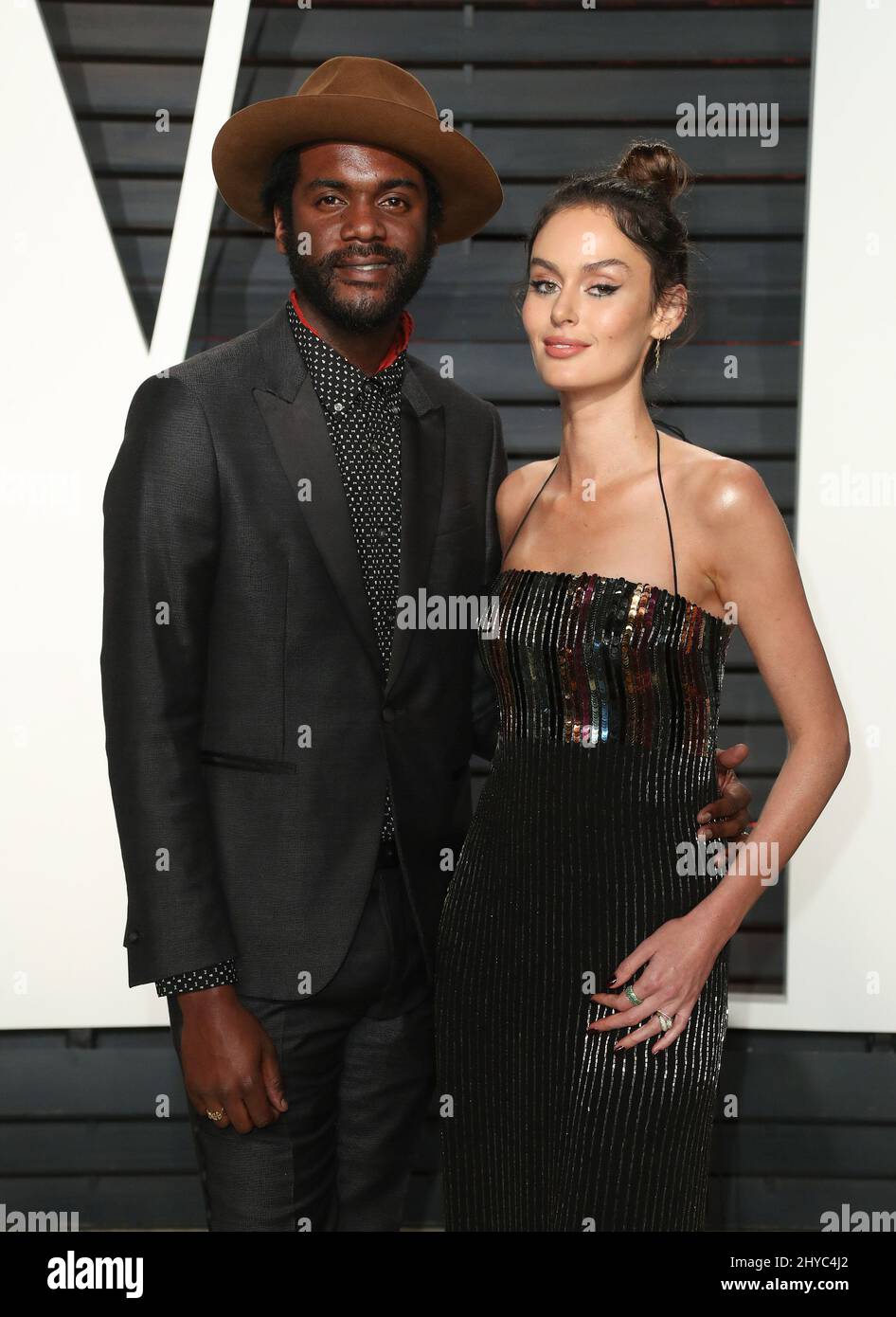 Gary Clark Jr., Nicole Trunfio arriving at the Vanity Fair Oscar Party ...