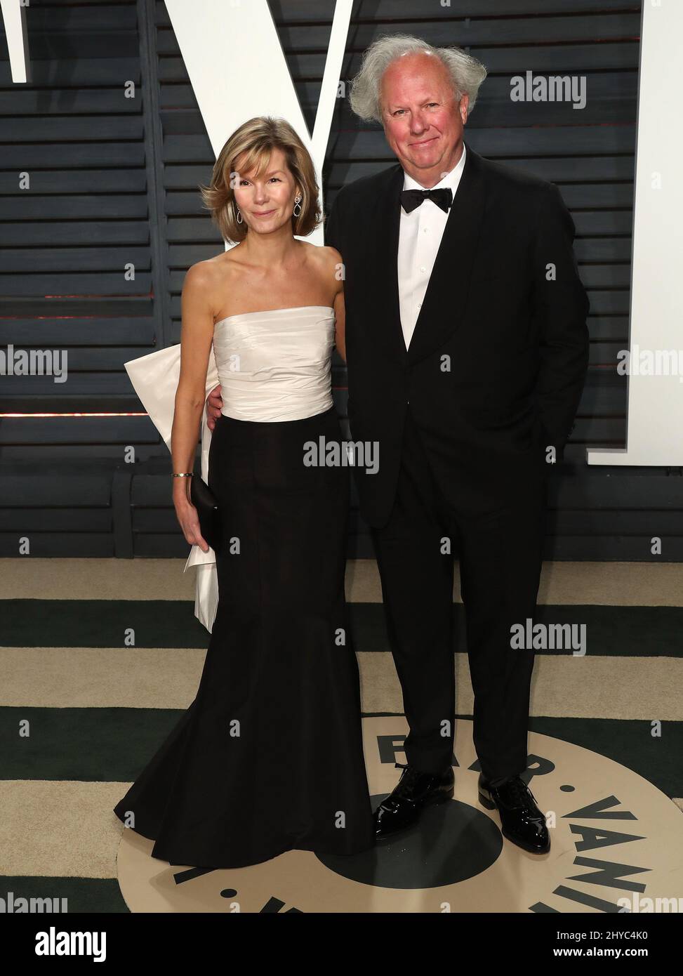 Graydon Carter and Anna Scott arriving at the Vanity Fair Oscar Party ...