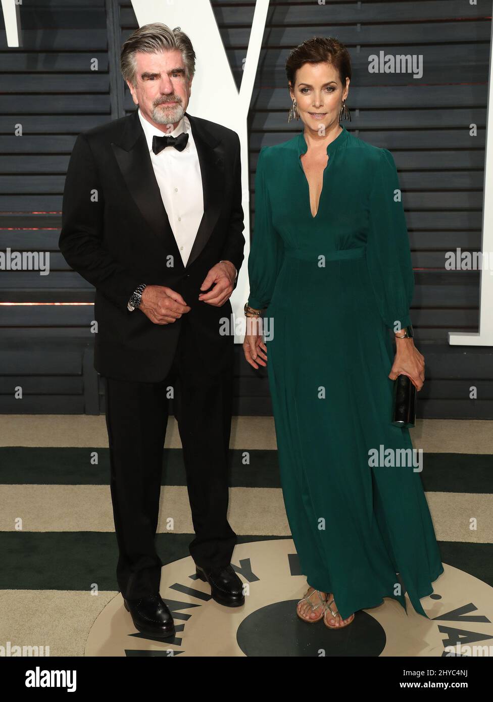 Tom Freston and Carey Lowell arriving at the Vanity Fair Oscar Party in ...