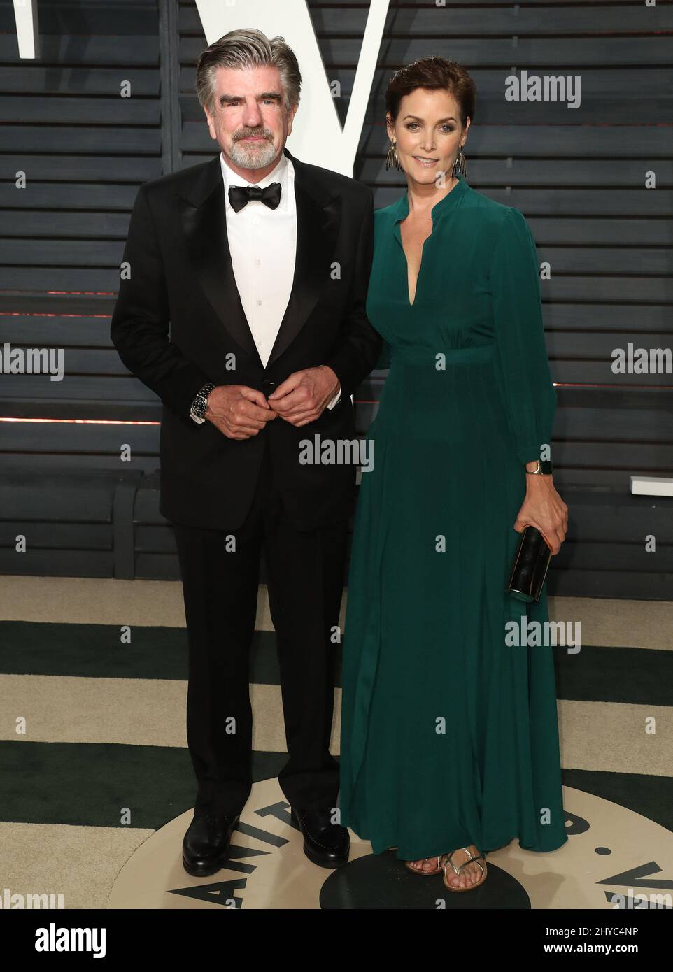 Tom Freston and Carey Lowell arriving at the Vanity Fair Oscar Party in ...