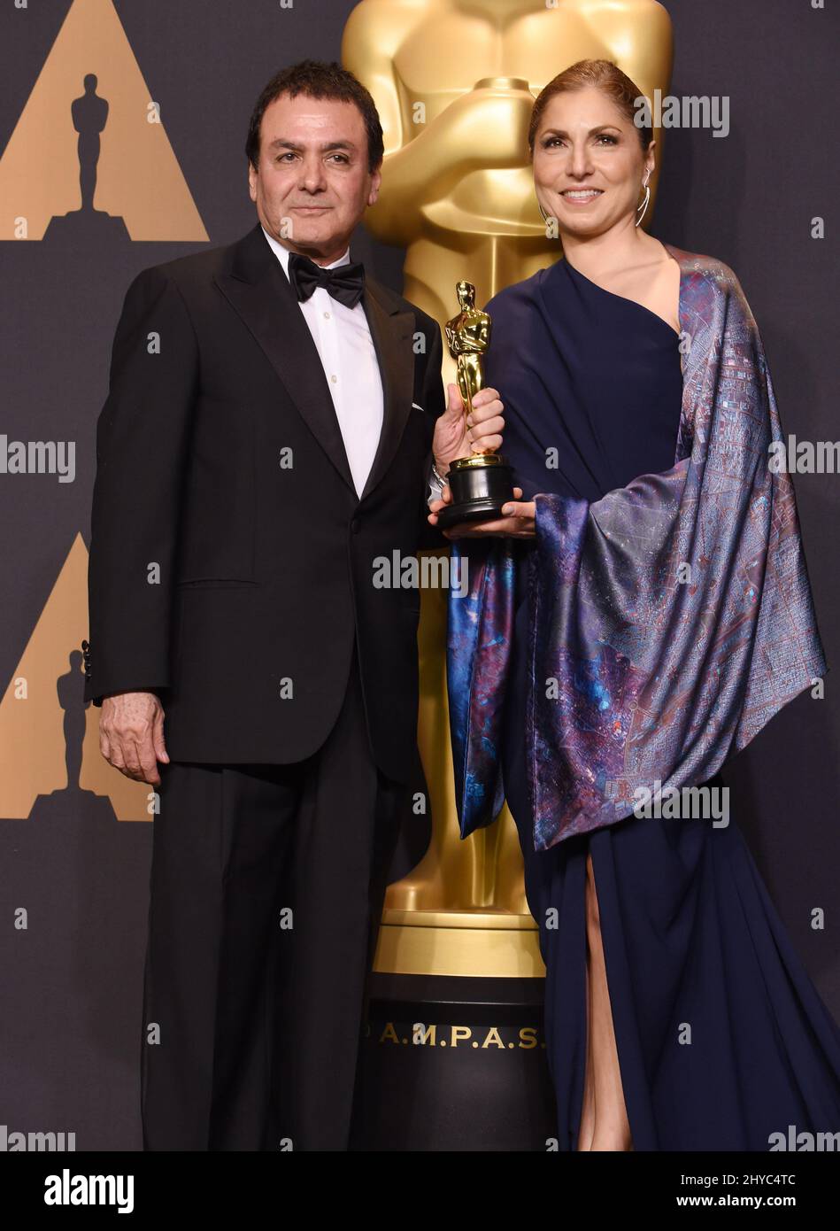 Dr. Firouz Naderi and Anousheh Ansari in the press room at the 89th ...