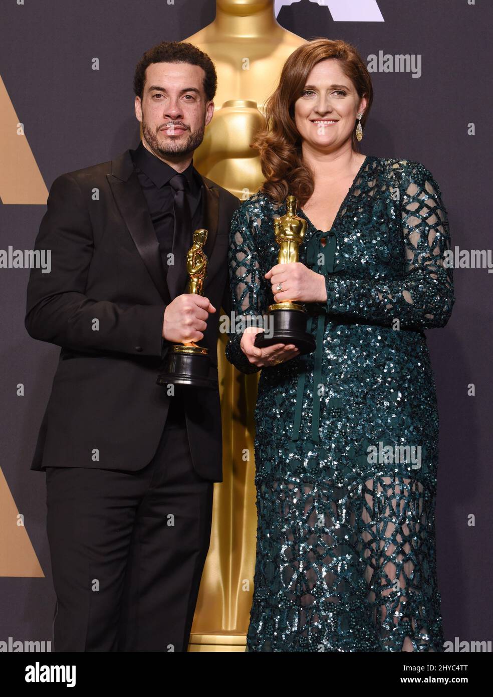 Ezra Edelman and Caroline Waterlow in the press room at the 89th Academy Awards held at the ...