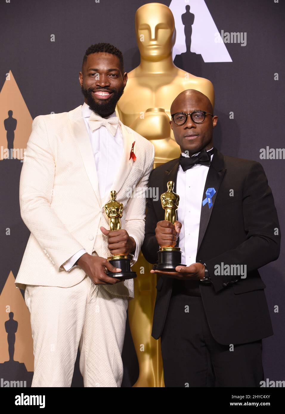 Tarell Alvin McCraney and Barry Jenkins in the press room at the 89th ...