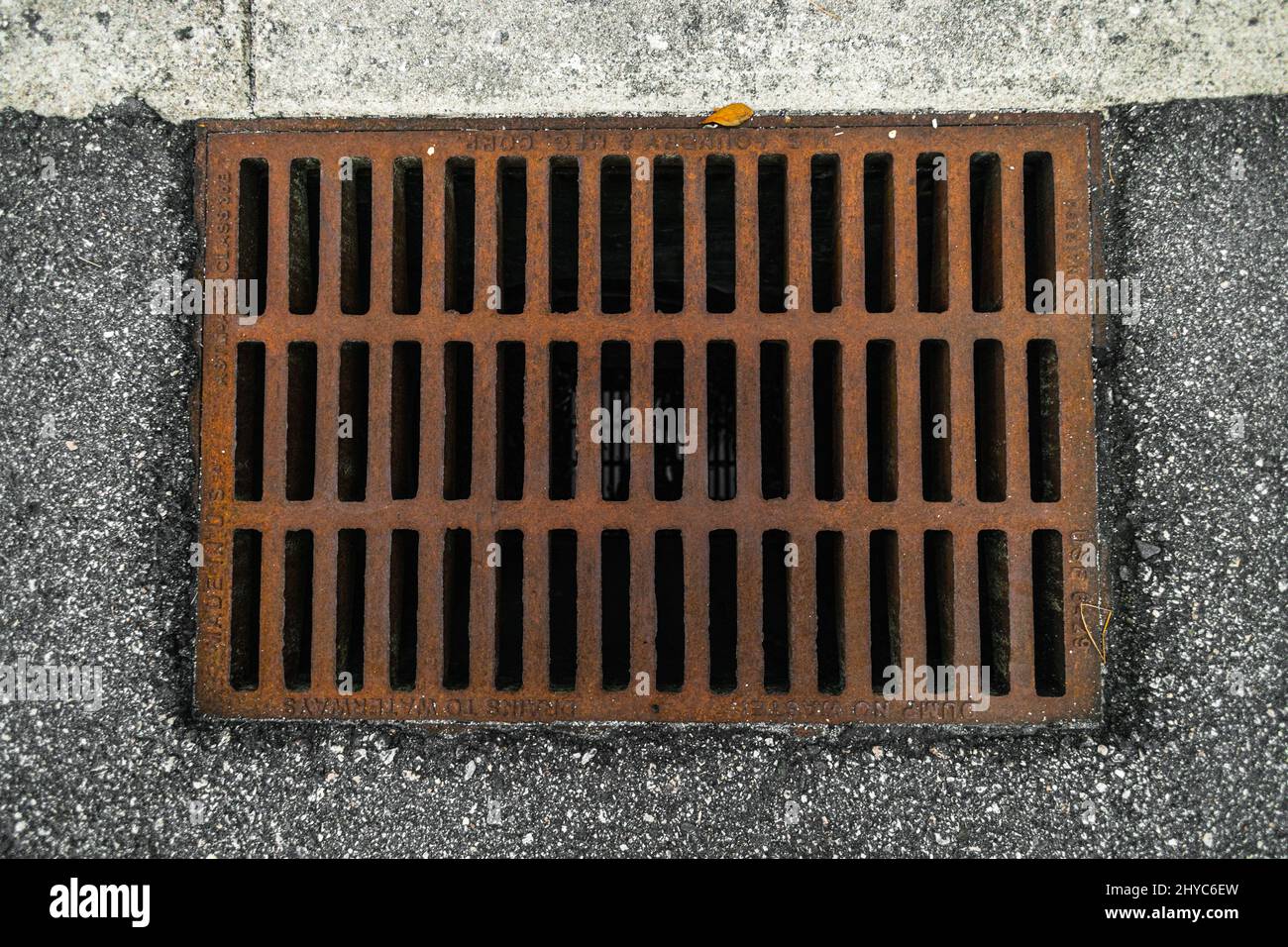 Closeup of a rusty metal grates of a storm drain Stock Photo - Alamy