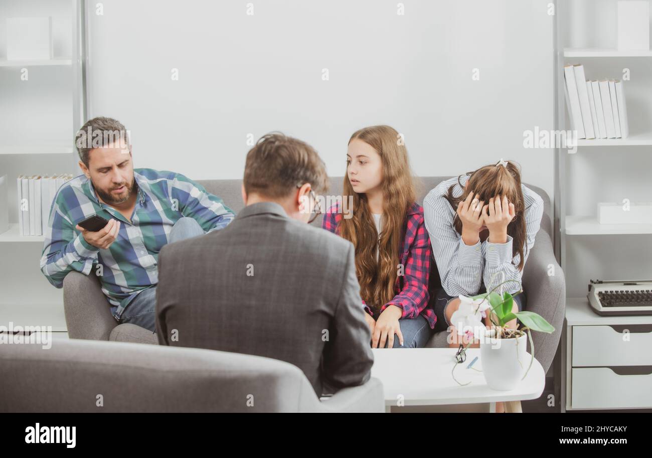 Family at psychology session. Psychologist give family therapy for dad ...