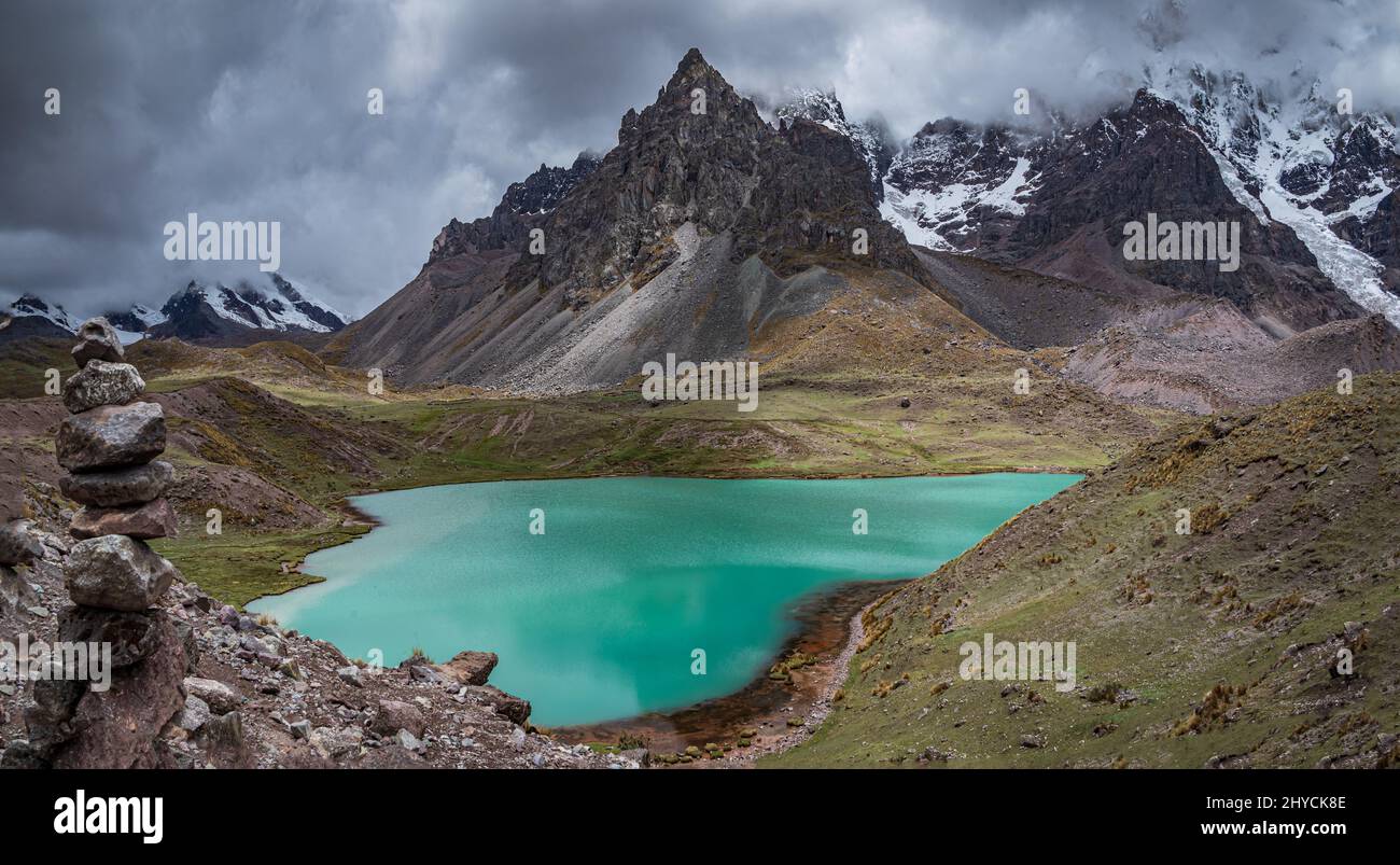 Shot of mountains and clouds surrounding seven lakes hike Peru Stock ...