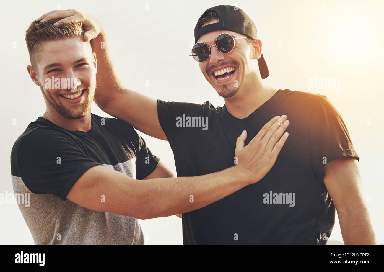 Two young men friends pose hi-res stock photography and images - Alamy