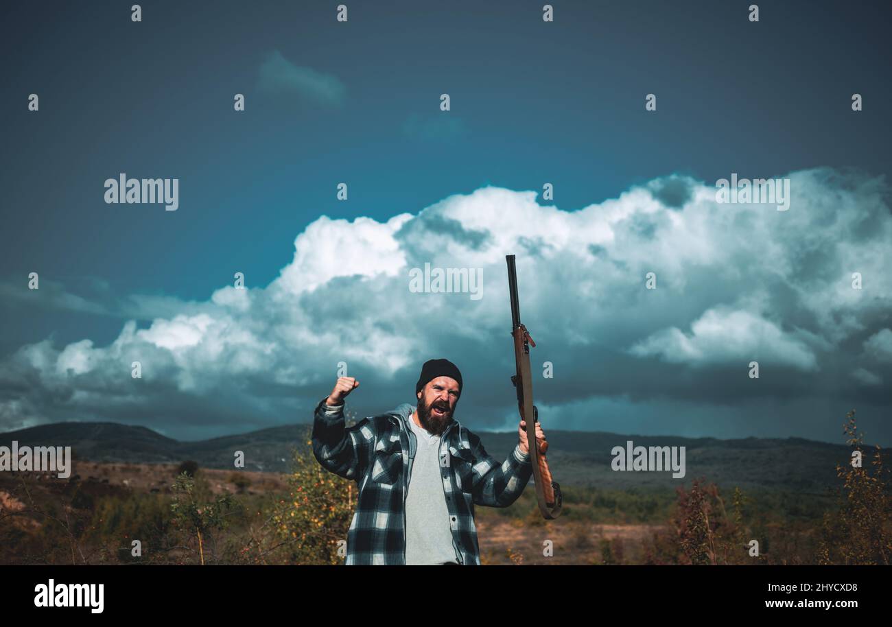 Poacher with Rifle Spotting Some Deers. Illegal Hunting Poacher in the ...