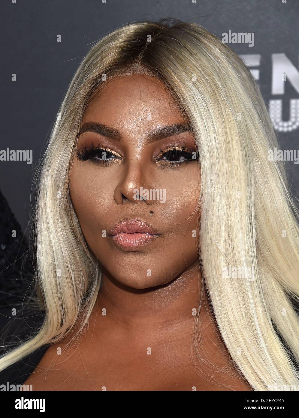 Lil' Kim attending the Can't Stop, Won't Stop: A Bad Boy Story premiere ...