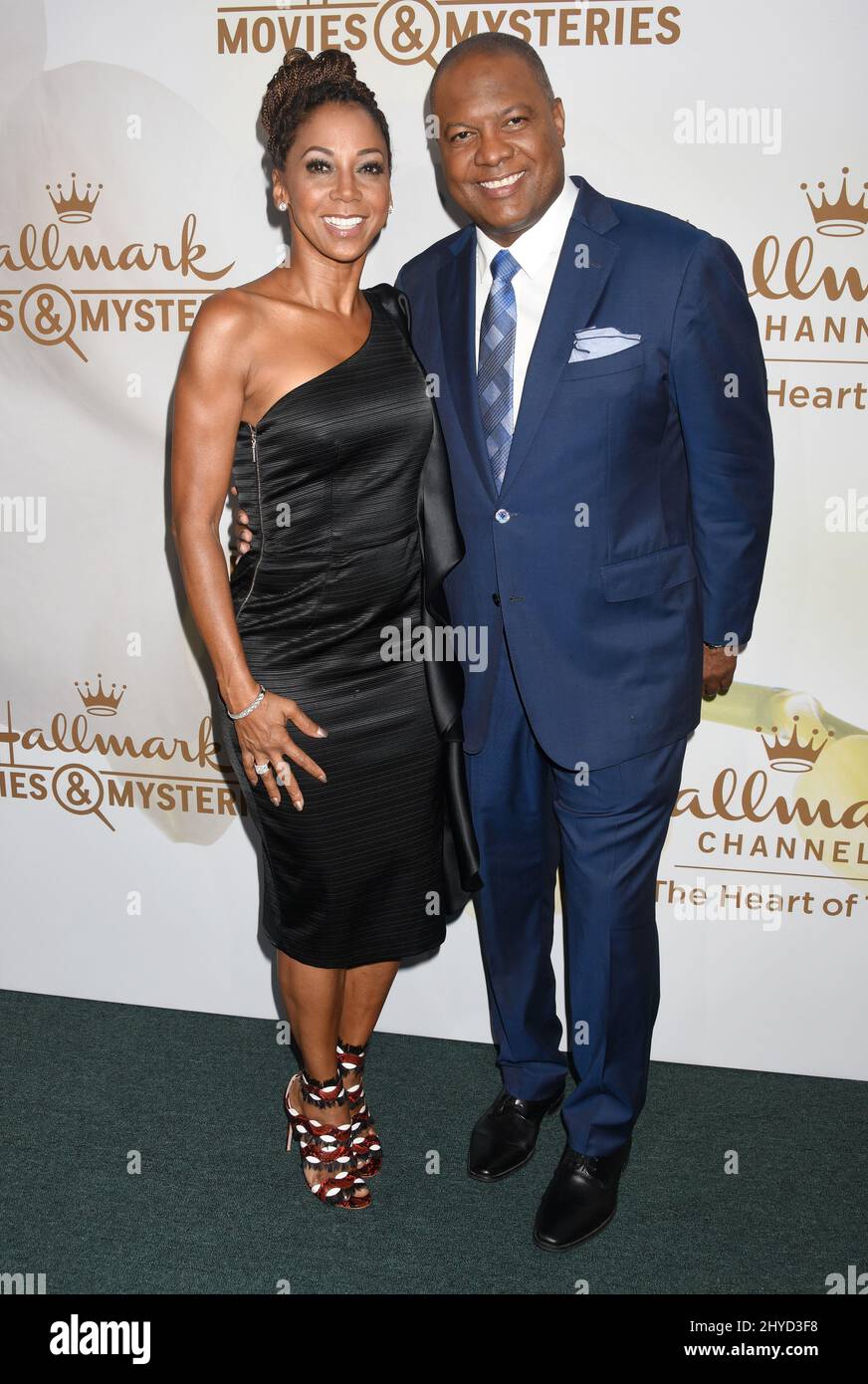 Holly Robinson Peete and Rodney Peete attending the Hallmark Channel ...