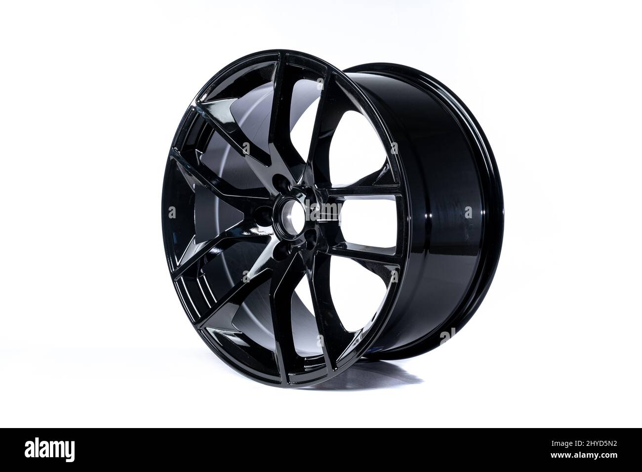 Modern car wheel isolated on a white background Stock Photo - Alamy