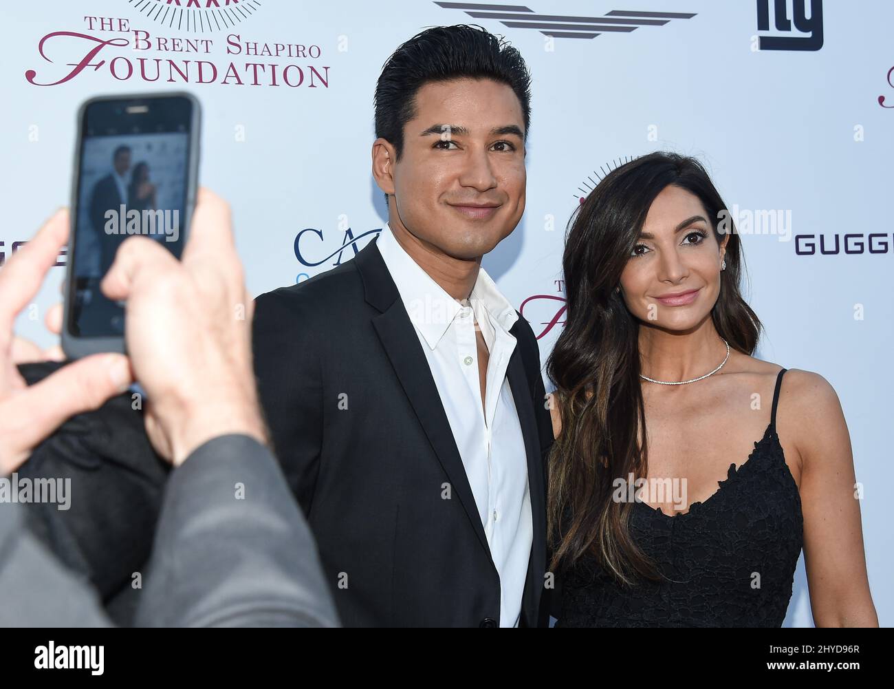 Mario Lopez and Courtney Laine Mazza attending the Brent Shapiro ...