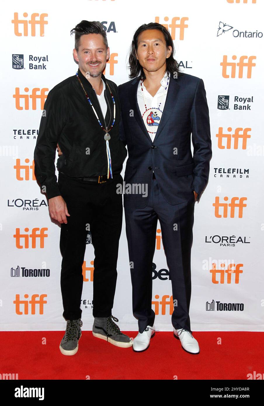Scott Cooper and Ken Kao attending the premiere of Hostiles, as part of ...