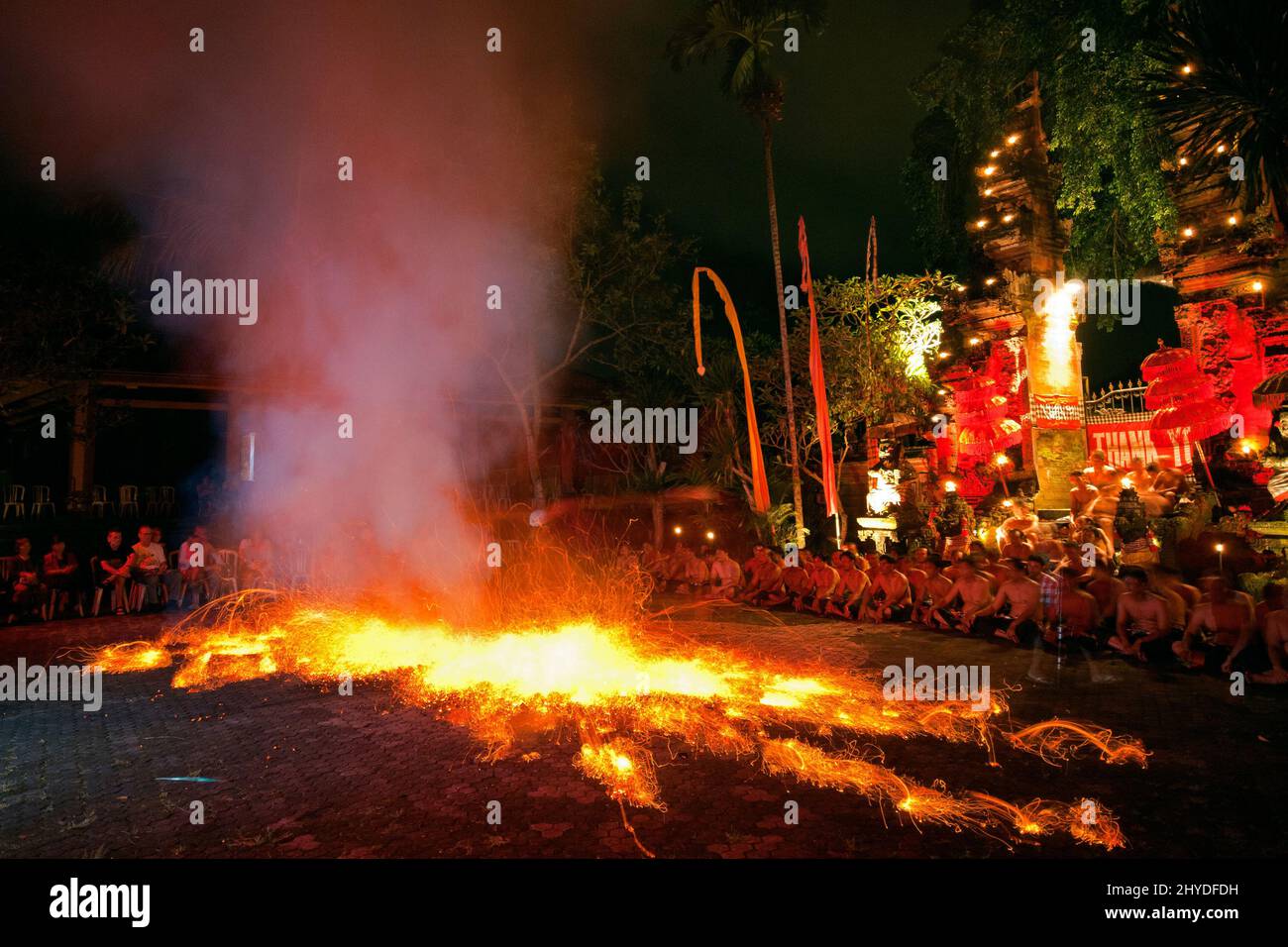 Balinese men perform Kecak fire and dance drama at the Pura Dalem ...