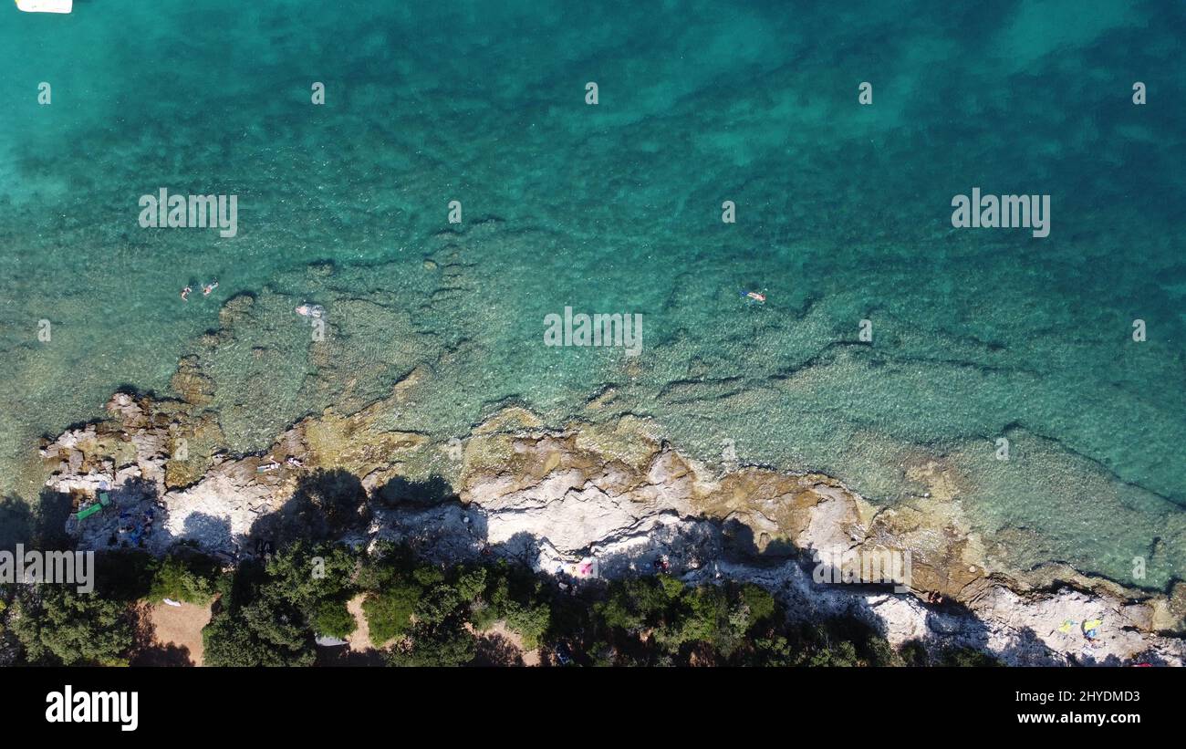 Aerial top view of the crystal clear teal water and the beach Stock ...
