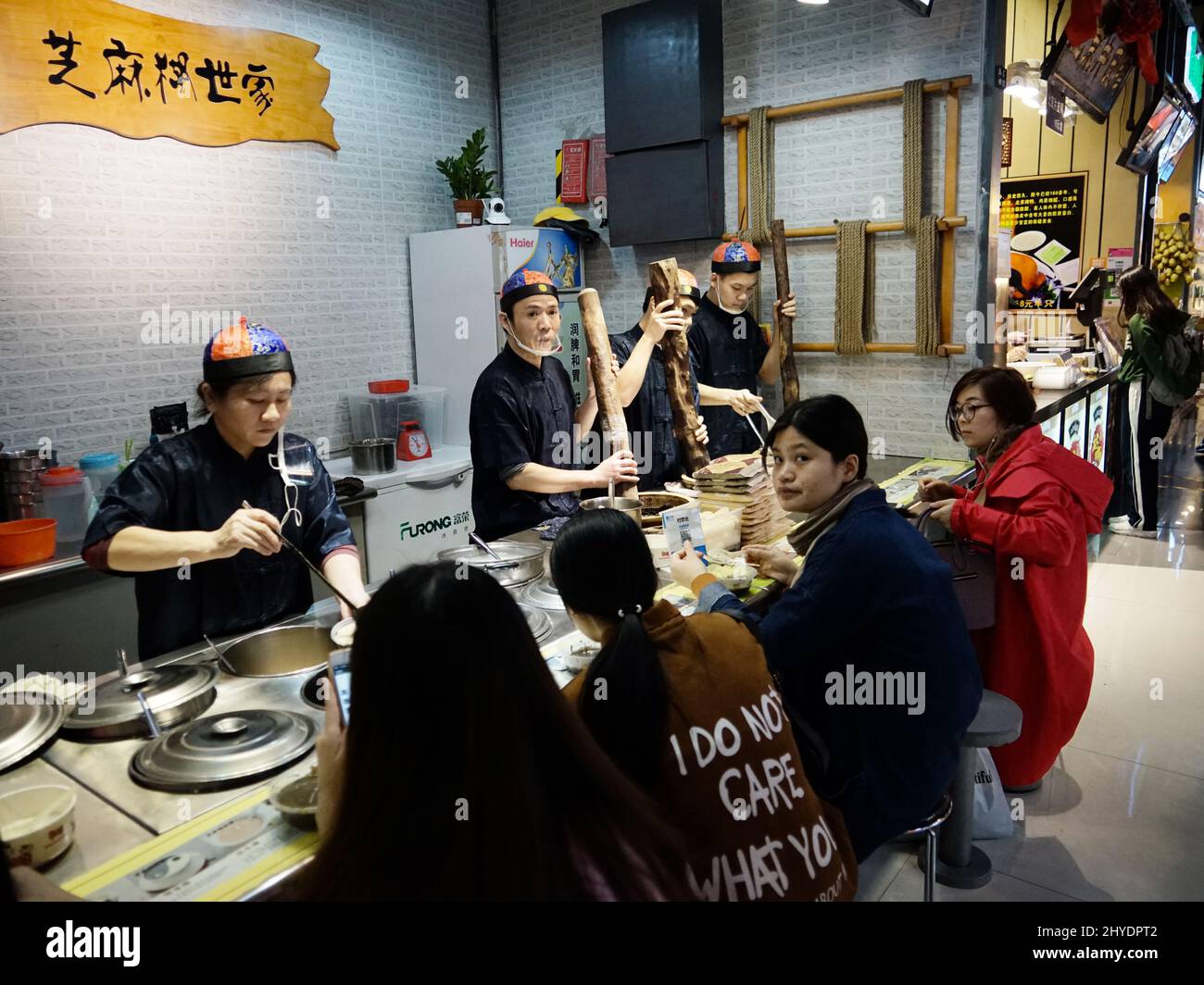 Chefs of a Chinese restaurant in Guangzhou cook different types of food ...