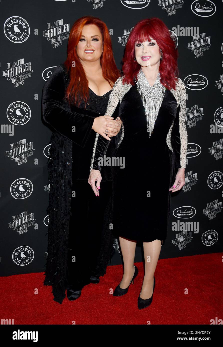 Wynonna Judd and Naomi Judd attending the Kenny Rogers 'All In For the ...