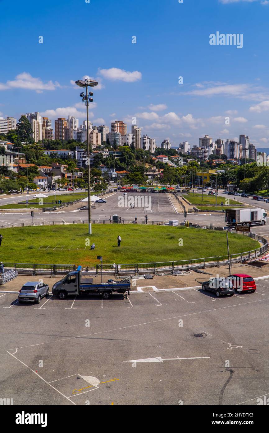Square with cars parked and high-rise buildings in San Paulo, Brazil ...