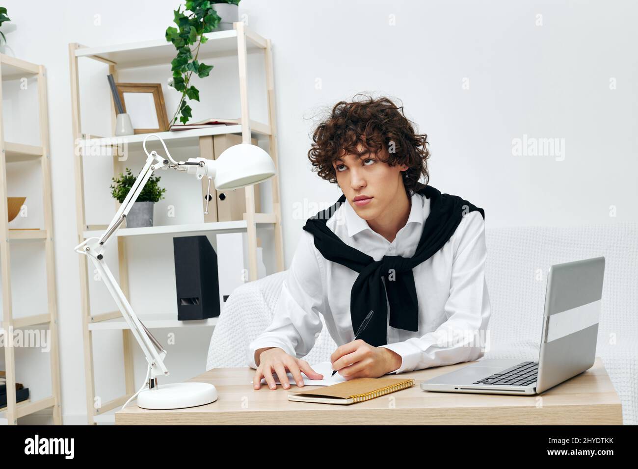 man online learning laptop interior home communication Stock Photo - Alamy