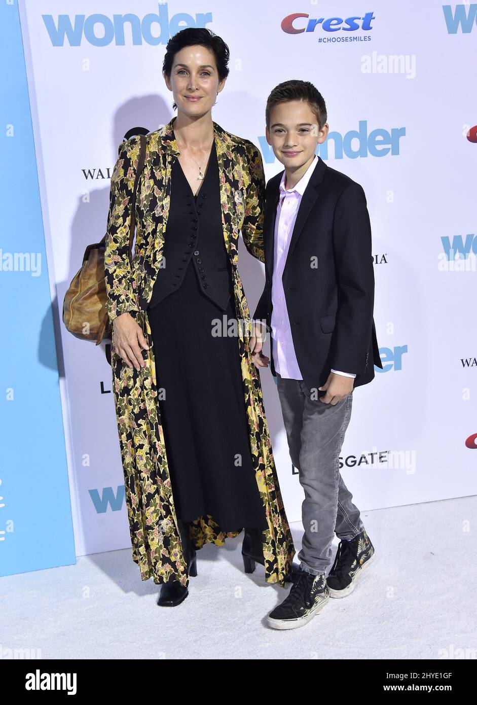 Carrie-Anne Moss and Jaden Roy attending the premiere of Wonder in ...