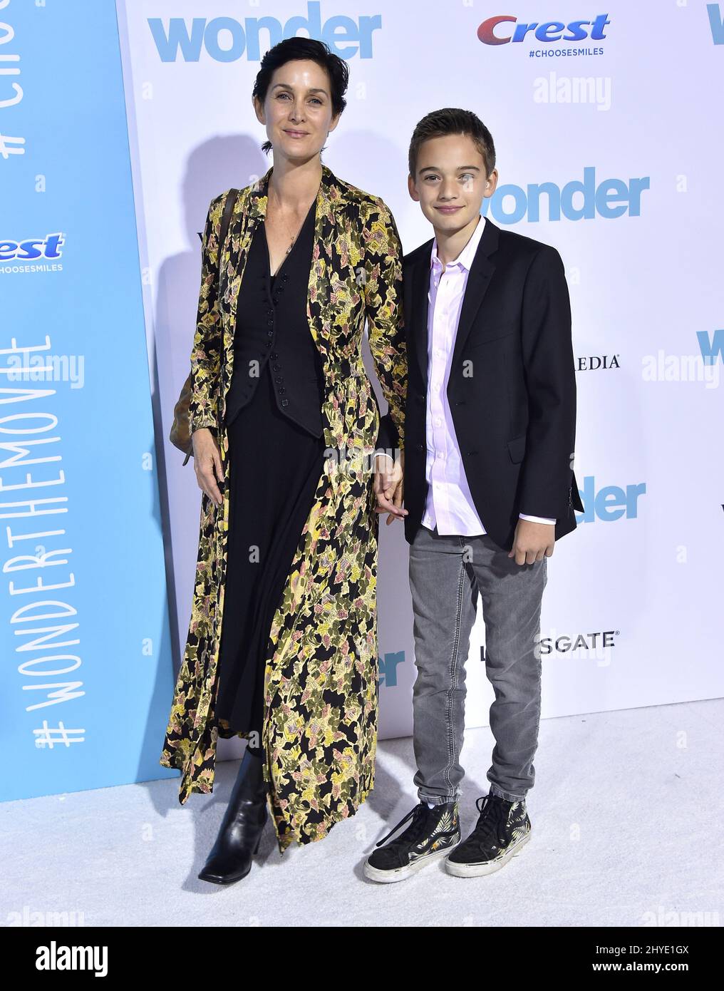 Carrie-Anne Moss and Jaden Roy attending the premiere of Wonder in ...