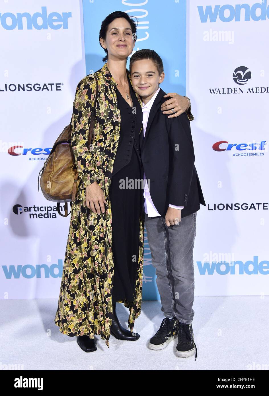 Carrie-Anne Moss and Jaden Roy attending the premiere of Wonder in ...