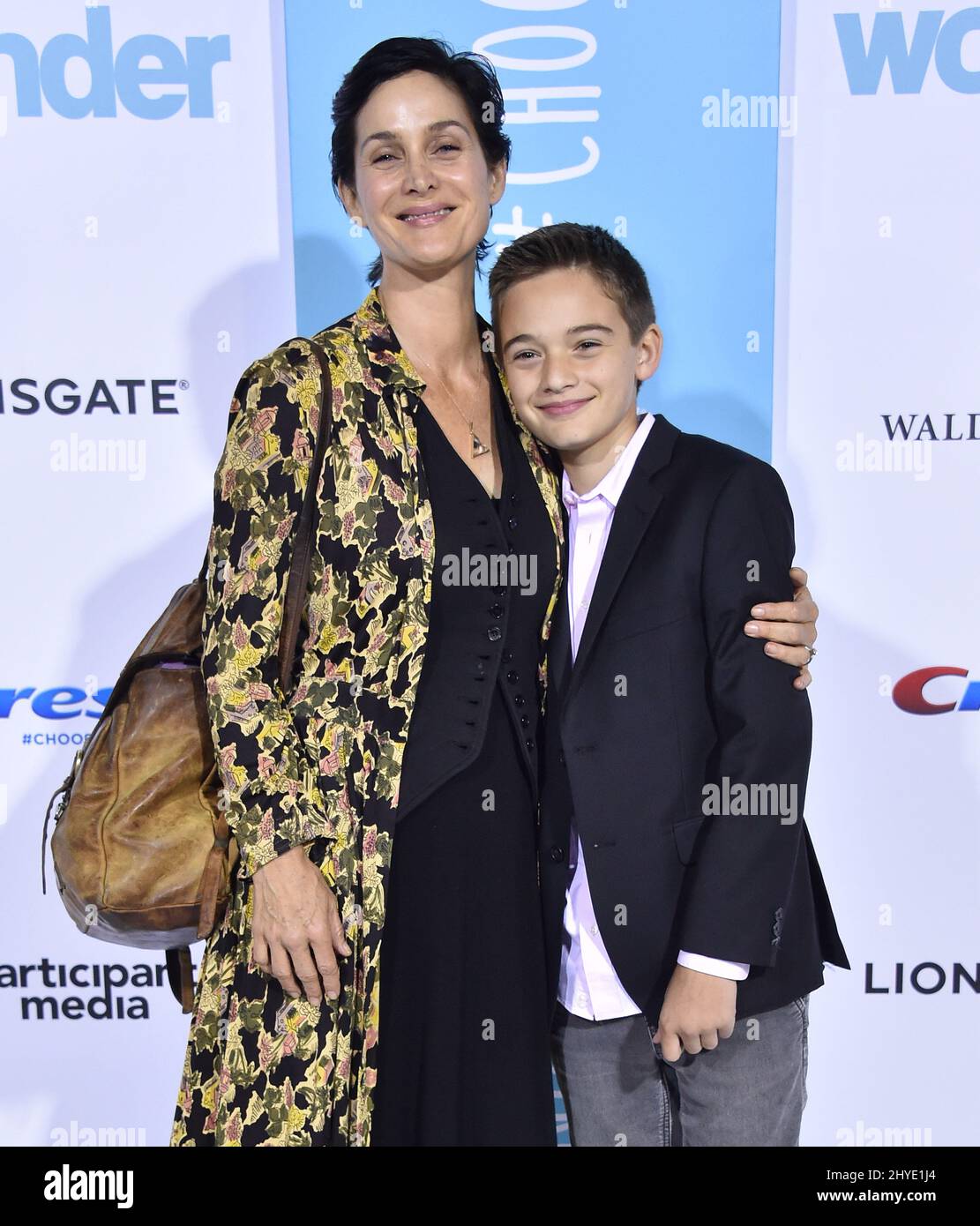 Carrie-Anne Moss and Jaden Roy attending the premiere of Wonder in ...
