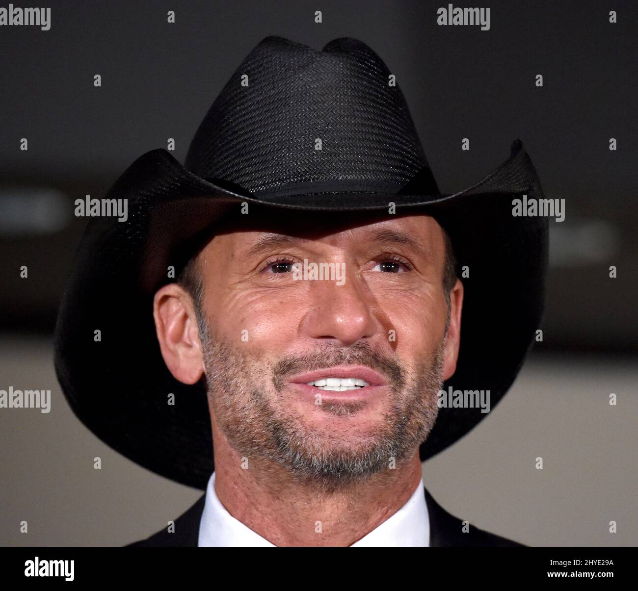 Tim McGraw speaks to his friends and family at the debut of the Tim ...