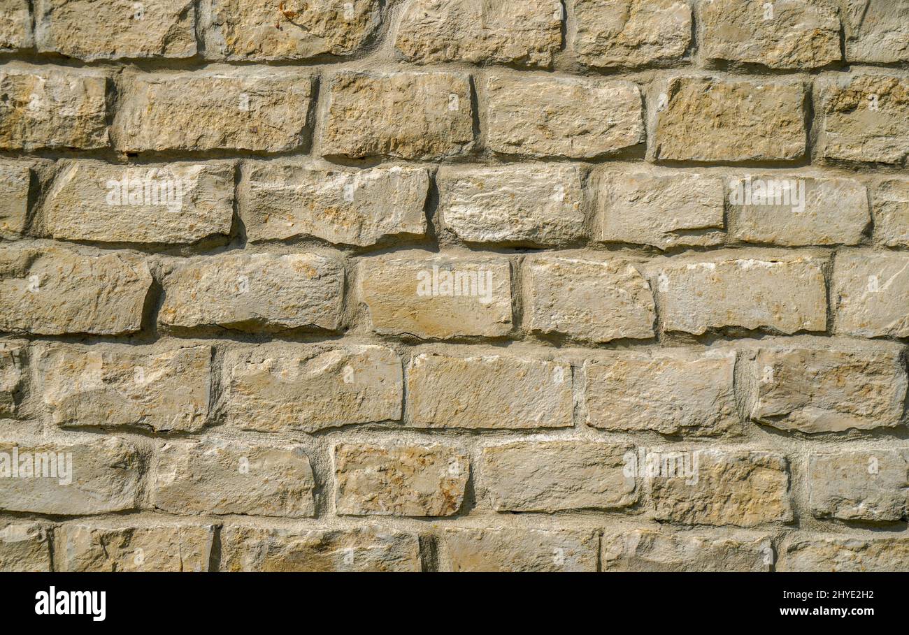 Old dressed stone wall background texture Stock Photo - Alamy