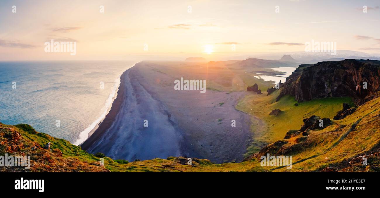 Amazing black sand of lava in the beach on small peninsula. Popular ...