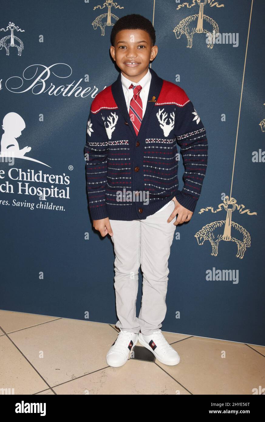 Lonnie Chavis attending the Brooks Brothers and St. Jude Annual Holiday ...