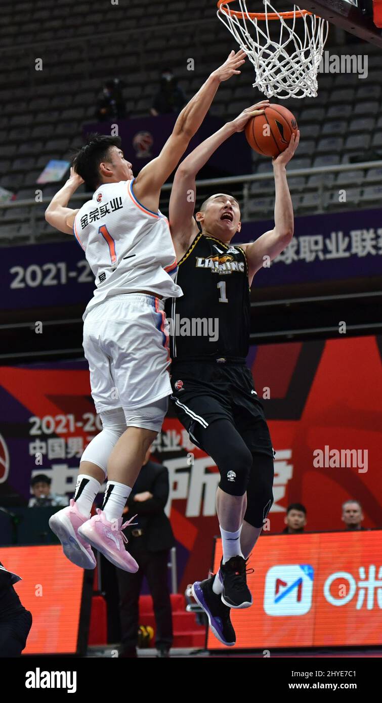 Shenyang. 15th Mar, 2022. Fu Hao (R) of Liaoning Flying Leopards ...