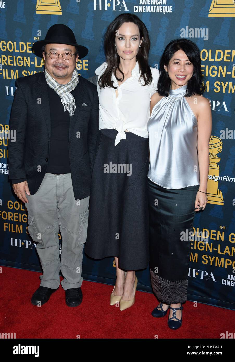Rithy Panh, Angelina Jolie and Loung Ung at the HFPA and American ...