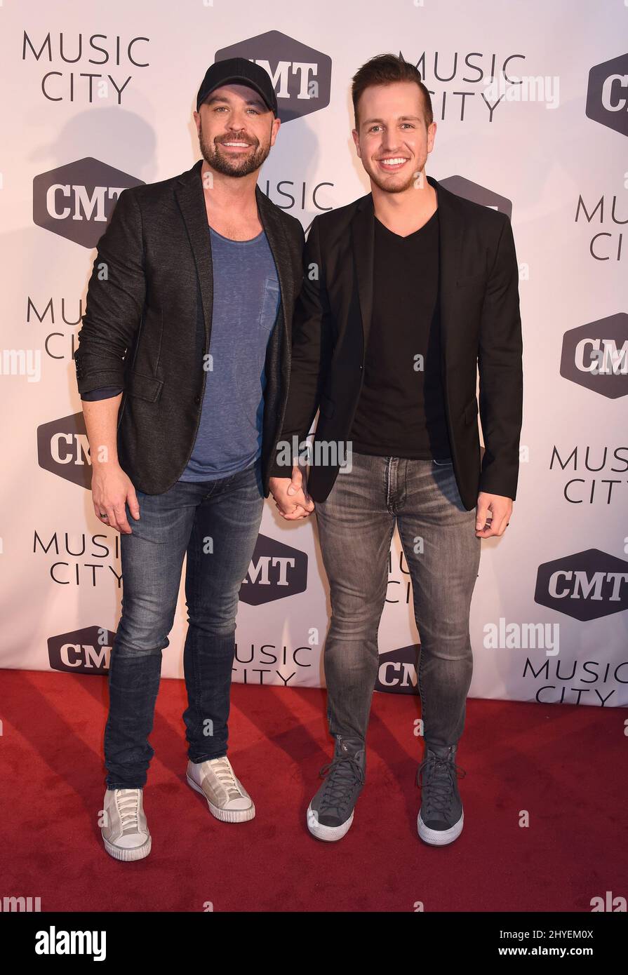 Cody Alan and Trea Smith attending CMT's 'Music City' Premiere Party in ...