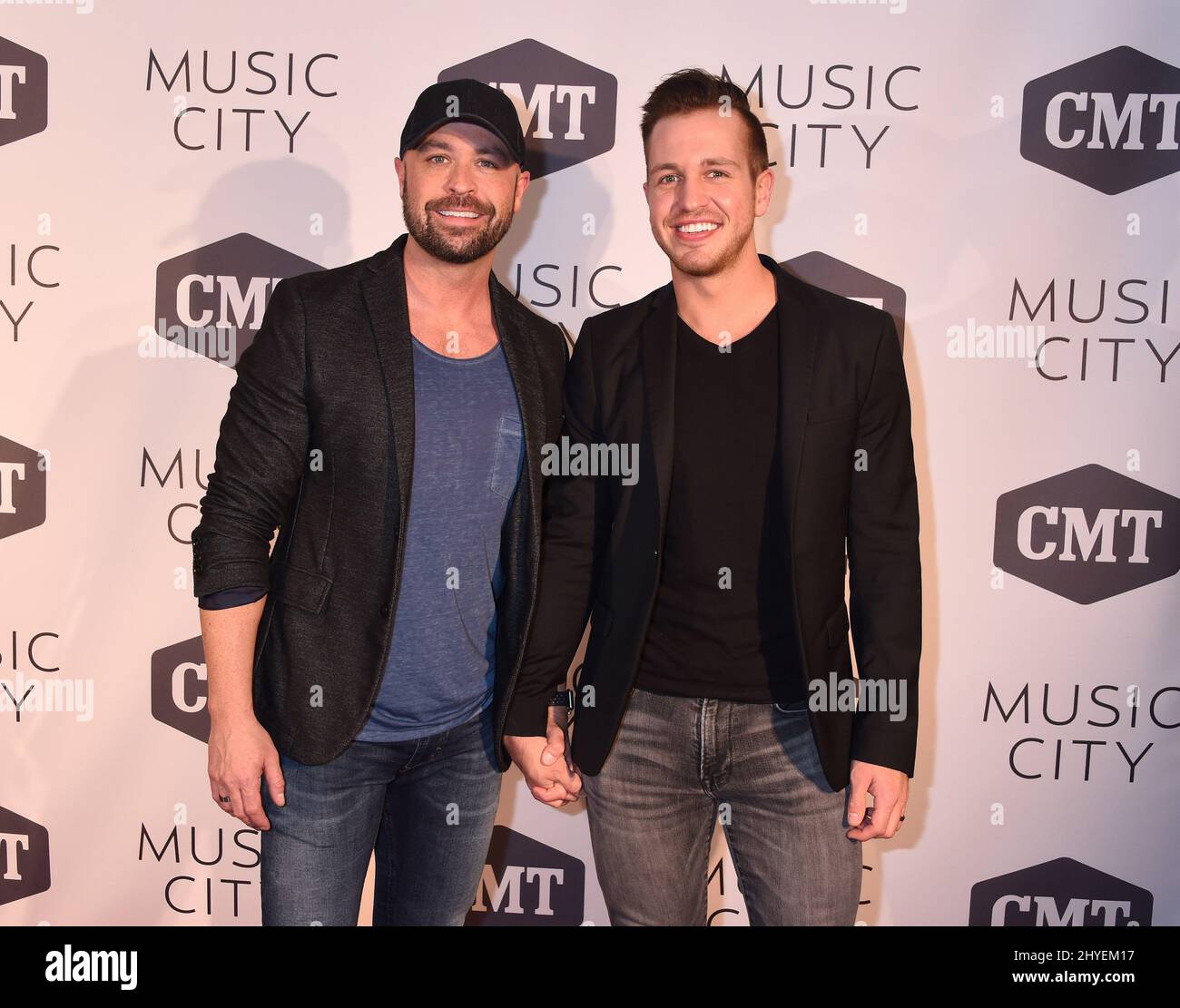 Cody Alan and Trea Smith attending CMT's 'Music City' Premiere Party in ...